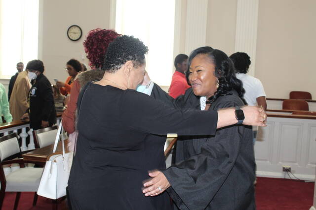 Probate Judge McCoy sworn in by father Magistrate Judge McQueen ...