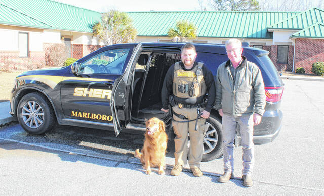 McBrayer donates funds to MCSO K-9 program - Herald-Advocate